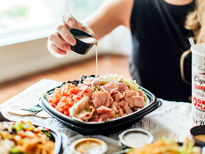 Someone's about to elevate their salad experience with a drizzle of dressing. All the sandwich flavors without the carb commitment.