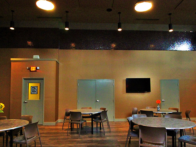 The dining area offers a moment of respite from the thunder of falling pins and victory shouts.