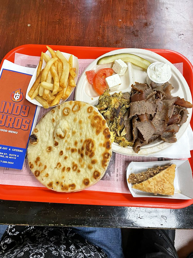The sampler platter of dreams&mdash;gyro meat, warm pita, fresh feta, and even a side of baklava. It's not indecision; it's strategic eating.