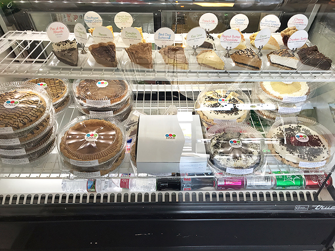 The display case at Pie Junkie isn't just refrigerated&mdash;it's a gallery of edible art. Each pie deserves its own spotlight and standing ovation.