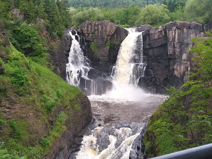 High Falls at Tettegouche State Park performs nature's most spectacular water dance, a short drive from Grand Marais and worth every mile.