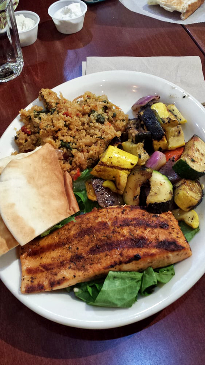 Not just salmon&mdash;it's the Meryl Streep of fish dishes. Perfectly grilled, served alongside vegetables and couscous that refuse to be overshadowed.