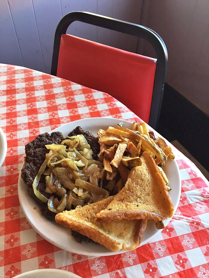 A hamburger steak topped with saut&eacute;ed onions proves that ground beef can dress up for the occasion without putting on airs.
