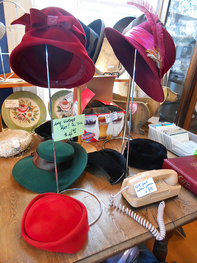 A milliner's dream display&mdash;where vintage hats wait for their Audrey Hepburn moment and rotary phones recall a simpler time.