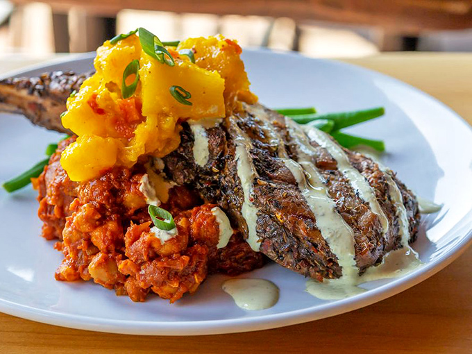 This isn't just a pork chop&mdash;it's a flavor explosion with mango salsa that makes your standard dinner look like it's not even trying.