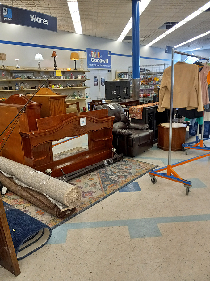 Lamps, headboards, and rolled carpets create a domestic obstacle course for the determined bargain hunter.