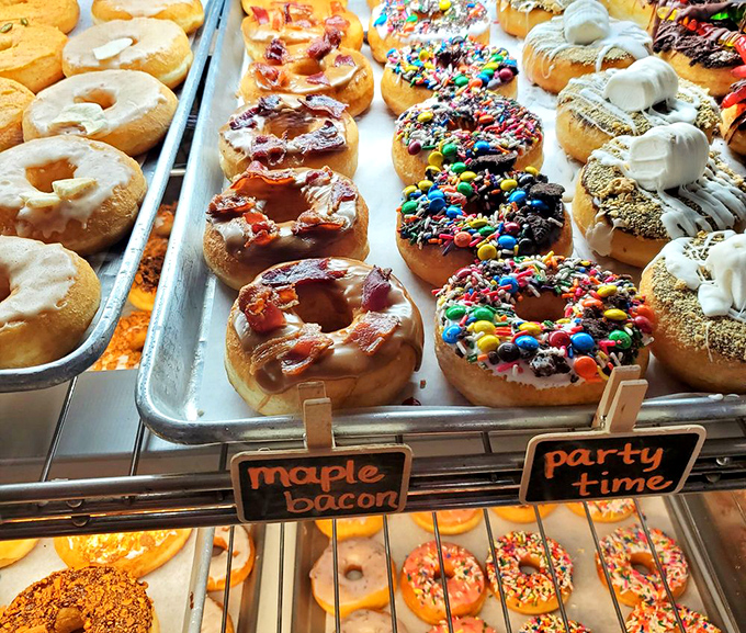 The maple bacon lineup stands at attention, ready for duty. Sweet maple glaze and savory bacon&mdash;breakfast's greatest hits album in donut form.