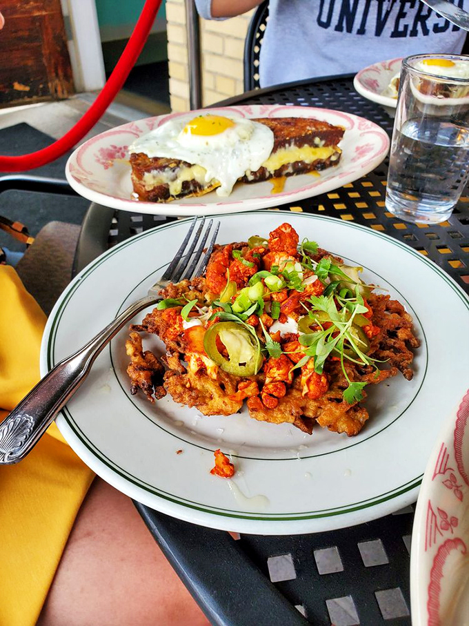 Breakfast fried chicken that demands your attention. The top plate's grilled cheese sandwich with egg could make a French chef reconsider their life choices.