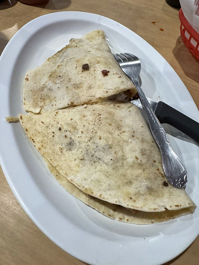 A quesadilla so perfectly grilled it makes you wonder why you ever settled for lesser versions. The cheese pull potential here is off the charts.