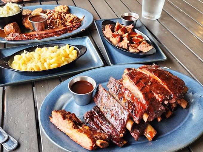 These ribs aren't just falling off the bone&mdash;they're practically volunteering to jump onto your fork alongside that golden mac and cheese.