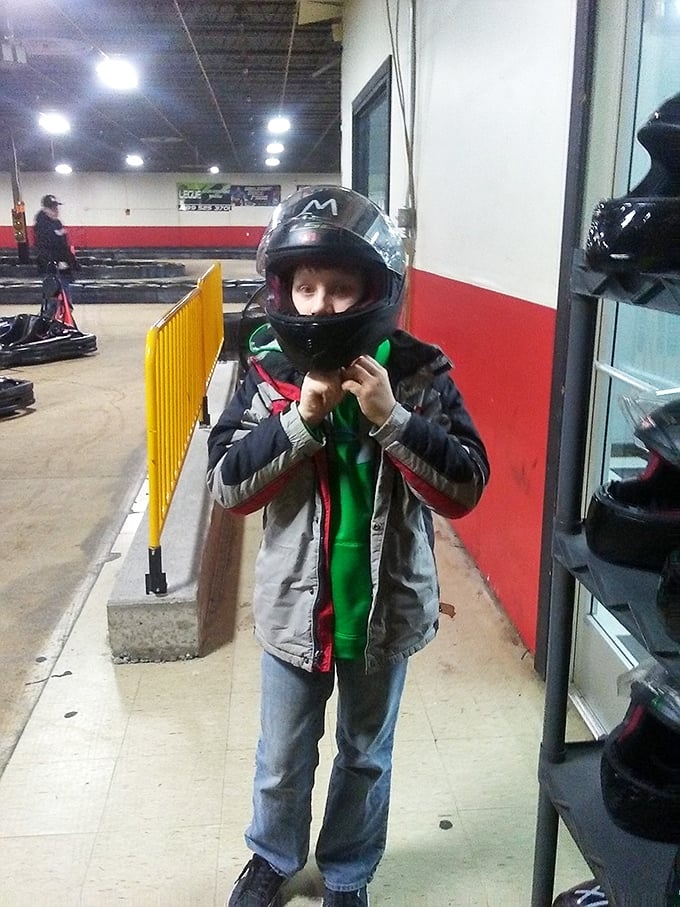 The universal expression of childhood joy hides behind that helmet visor, proving some thrills transcend age, even in the heart of Michigan.