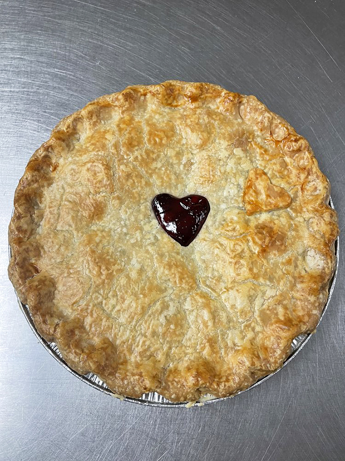 A homemade pie complete with heart-shaped vent &ndash; evidence that someone in this kitchen understands both pastry and sentiment.