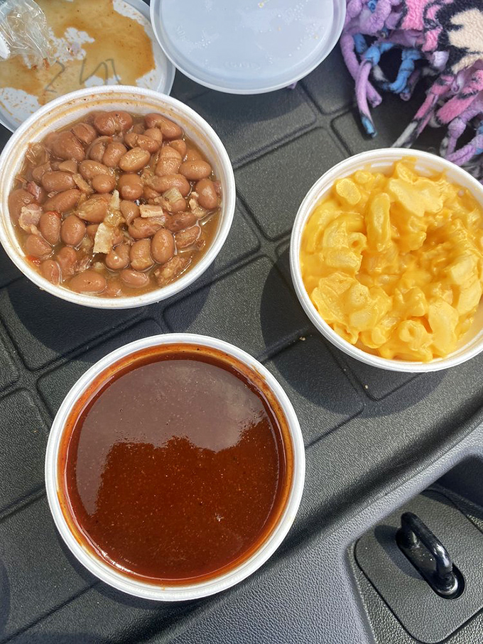 The supporting cast deserves applause too: beans with bits of pork, mac and cheese that glows like a sunset, and sauce that ties it all together.