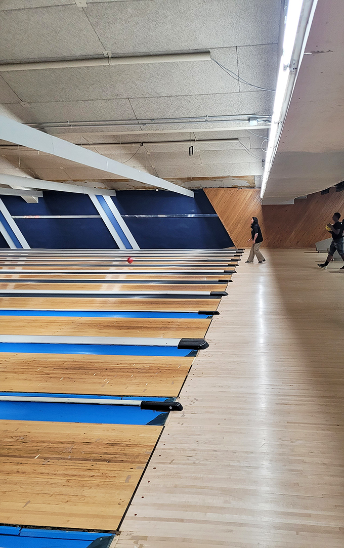 From this angle, you can almost hear the symphony of pins falling and the accompanying chorus of cheers and good-natured trash talk.