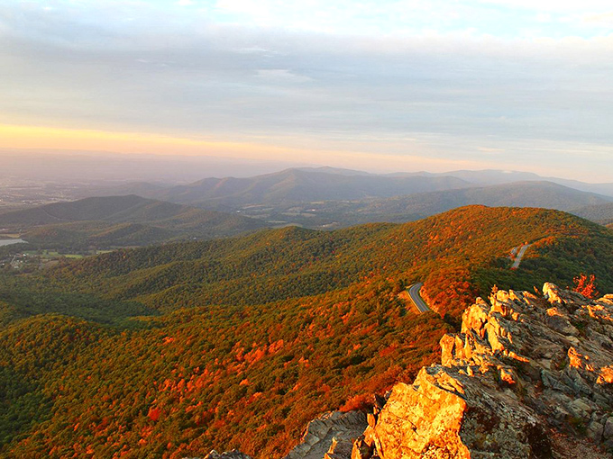 Autumn sunset from Skyline Drive paints mountains in gold. When Mother Nature decides to flex her artistic muscles, all you can do is stand back and slow-clap in appreciation.