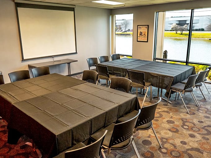 The Monza Room: where PowerPoint presentations take a backseat to power moves on the asphalt outside.