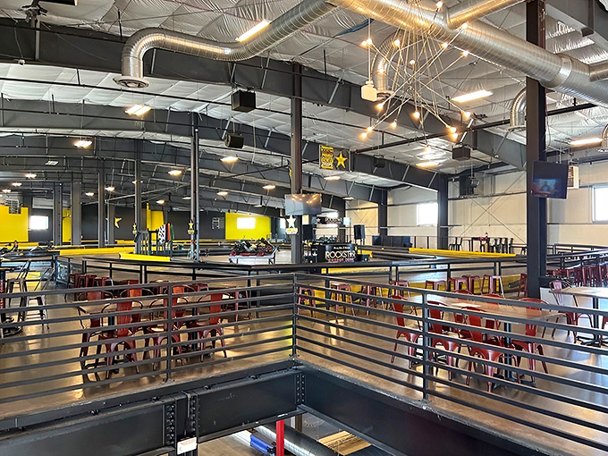 The industrial-chic dining area offers the perfect vantage point to scout the competition while plotting your next racing strategy.