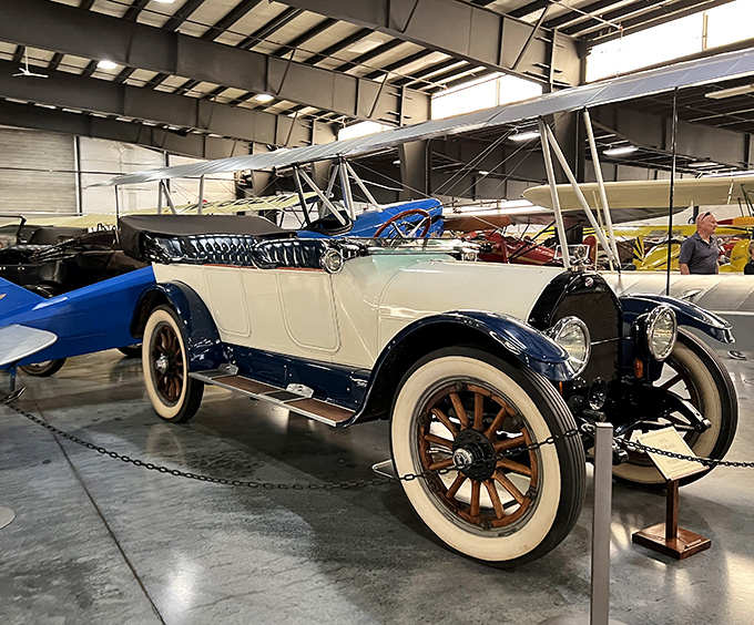 The burgundy 1941 Chevrolet gleams under museum lights, a testament to when American design married function with unabashed style.