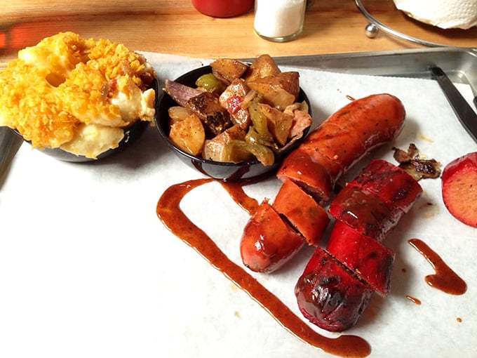 Mac and cheese wearing a crown of golden crust, potatoes mingling with sausage slices &ndash; sides that refuse to be overshadowed.