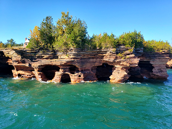 Nature's architecture outshines human efforts at the Apostle Islands, where sandstone caves tell stories written by waves over millennia.