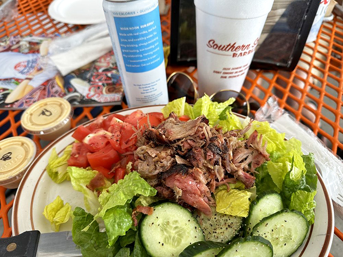 The salad that meat-lovers order without shame. Tender barbecue atop fresh greens&mdash;because balance is important, even in paradise.