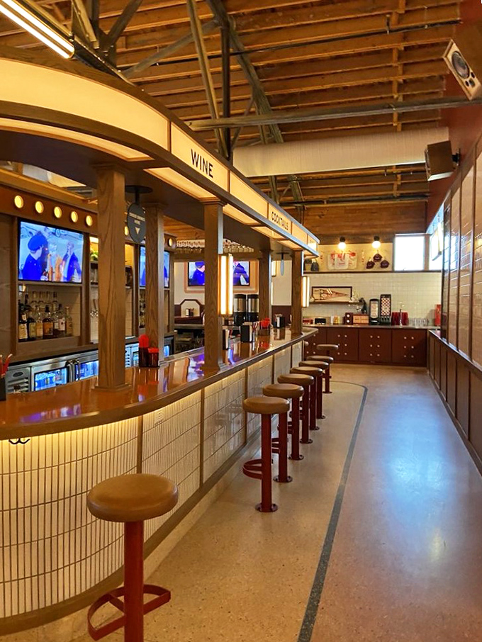 The bar area glows with possibility, promising craft beverages that stand up to the food. Wood, tile, and lighting combine for modern nostalgia.