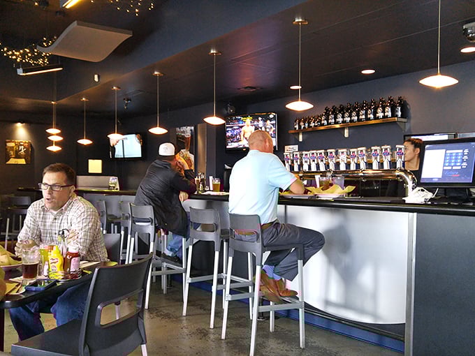 The bar area: where beer dreams come true. Those taps aren't just dispensing craft brews&mdash;they're pouring liquid happiness.