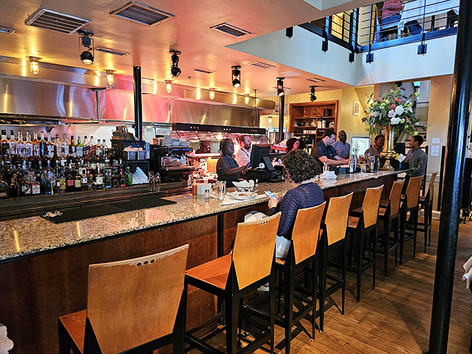 A Southern breakfast worth setting your alarm for. That biscuit sitting atop ham in gravy is practically royalty.