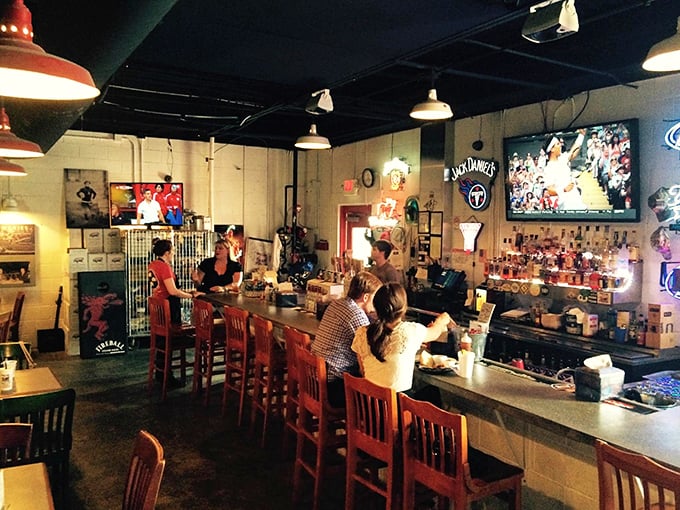 The bar area&mdash;where strangers become friends over bourbon and debates about dry rub versus sauce.