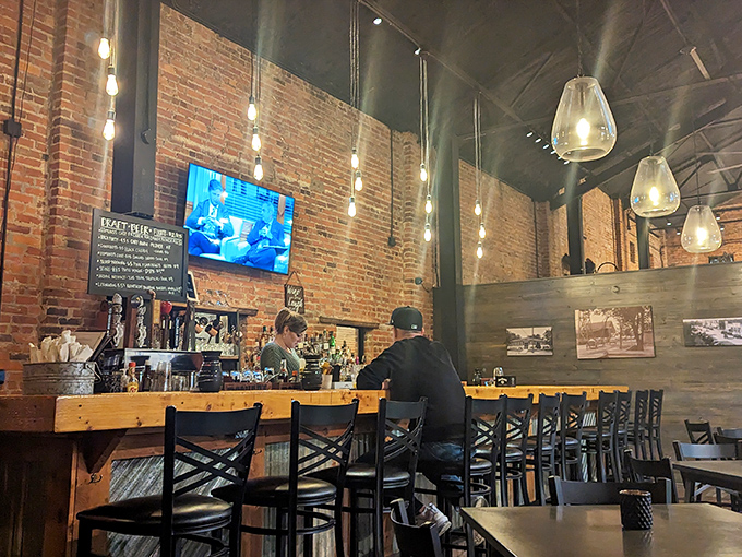 The bartender isn't just mixing drinks&mdash;they're conducting an orchestra of flavors under the glow of perfectly positioned pendant lights.