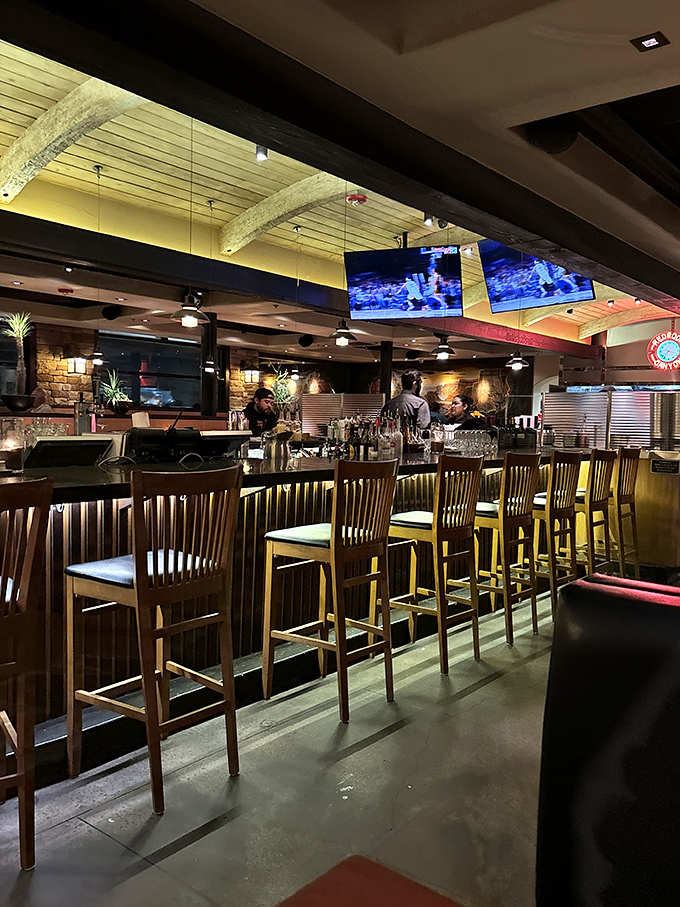 Bar seating that invites lingering, where bartenders craft drinks with the precision of scientists and the flair of Broadway performers.