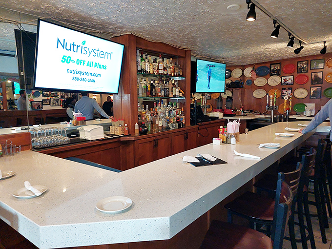 The bar area—where strangers become friends and friends become family over cold cervezas and warm chips.