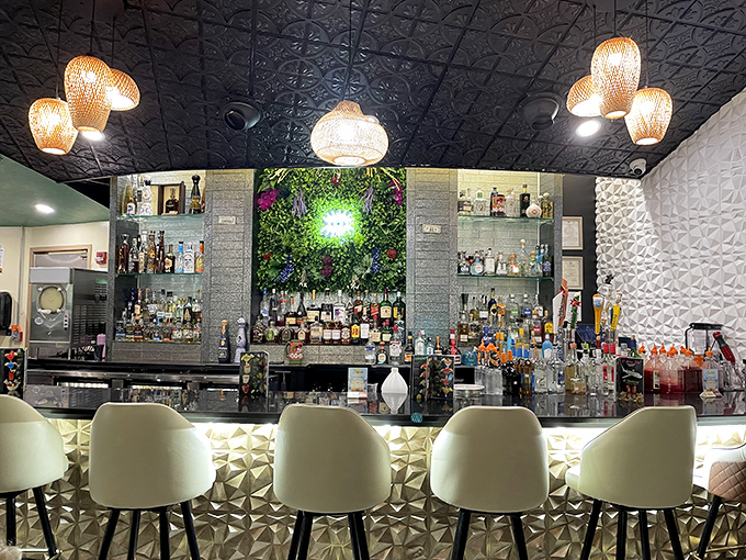 A bar that means business&mdash;where tequilas line up like soldiers ready for duty in your margarita. The modern lighting says "fancy," but the vibe says "relax."