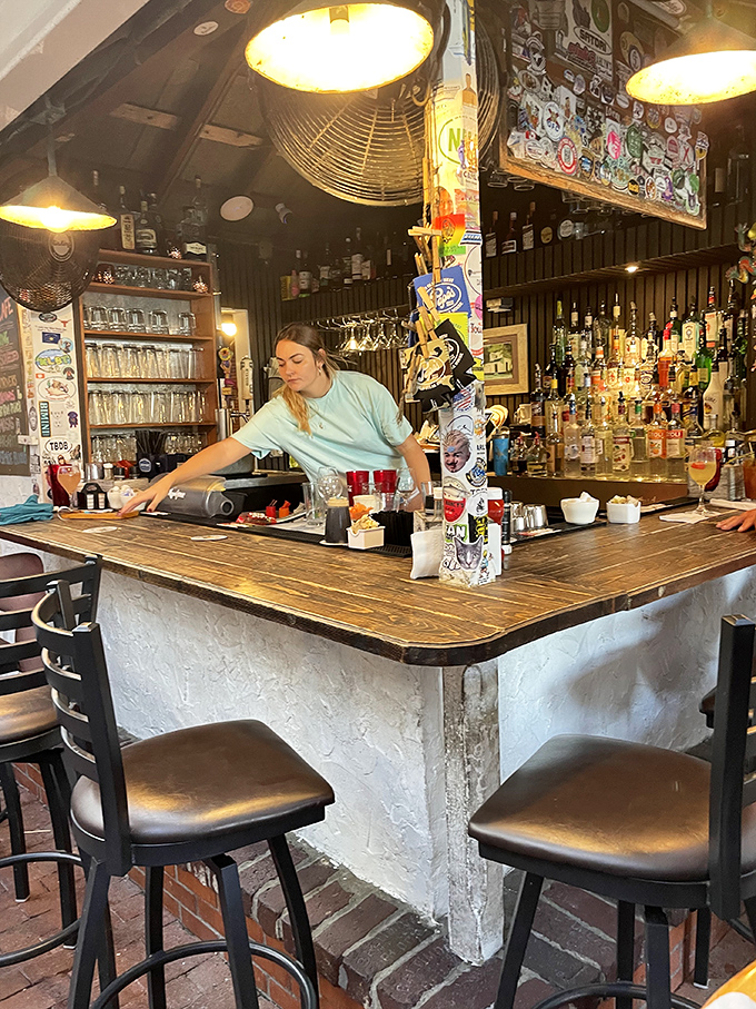 The bar isn't just serving drinks&mdash;it's crafting liquid souvenirs, with bottles standing at attention ready to transform your ordinary morning into island time.