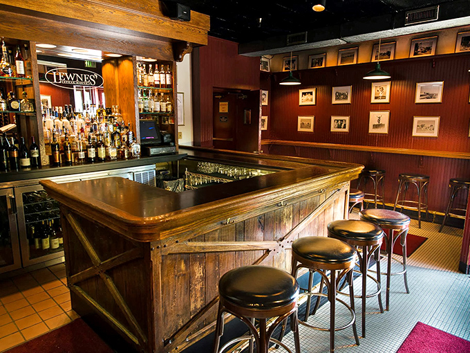 The bar area beckons with the promise of perfectly mixed cocktails and pre-dinner conversation. That polished wood has heard more stories than a bartender on New Year's Eve.