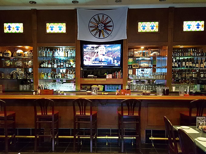 A bar stocked with enough spirits to raise your own. The perfect place to debate Alabama football while waiting for your table.