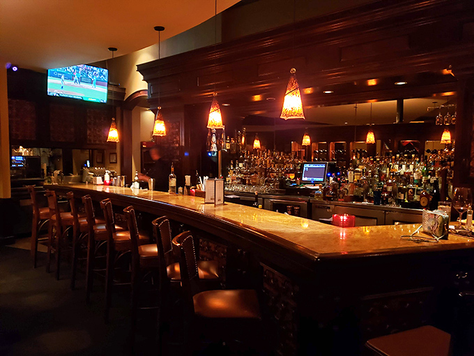 The bar at Pampas&mdash;where bourbon flows, sports flicker on screens, and strangers become friends over tales of great steaks past.