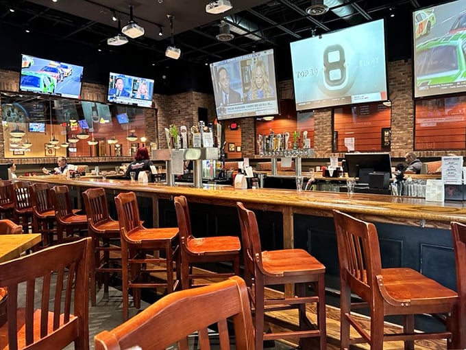 A bar that understands its mission: provide comfortable seating, cold drinks, and enough TVs to catch every Ravens play without straining your neck.
