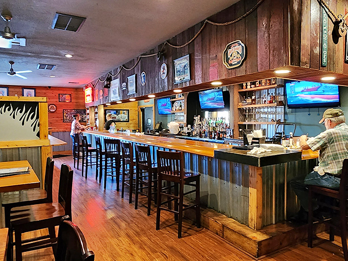 A bar that understands its mission: provide liquid refreshment to wash down smoky goodness while sports play quietly overhead.