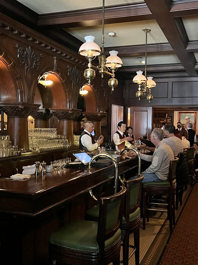 The bar isn't just where you wait for your table &ndash; it's where Manhattan cocktails are crafted with the reverence of a religious ceremony.