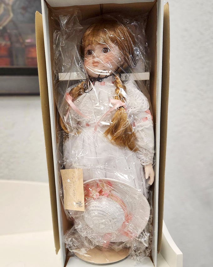 Porcelain perfection awaiting a new home. This doll hasn't aged a day since Reagan was president, unlike the rest of us.