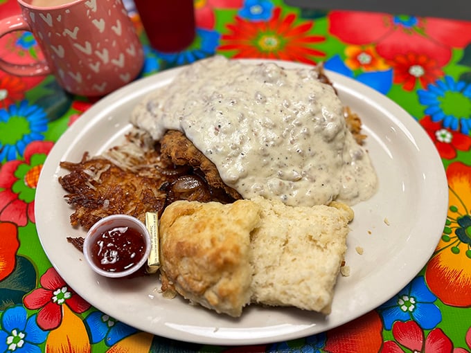 Biscuits and gravy with a side of fresh fruit&mdash;because balance is important when you're having a religious experience at breakfast.