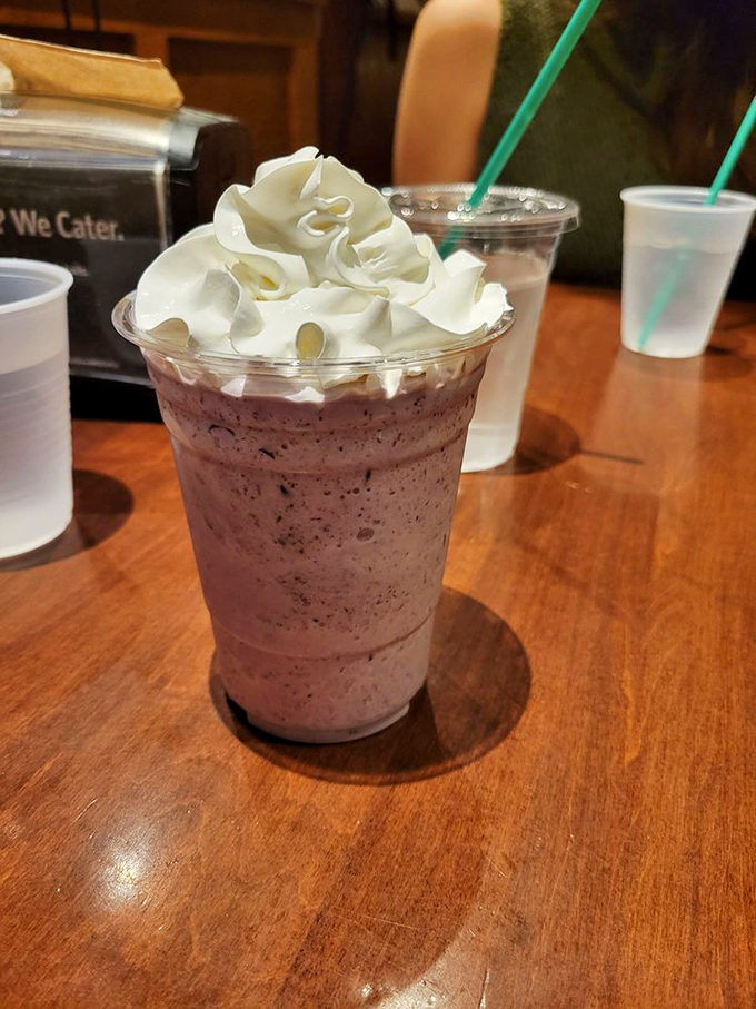 This isn't just a milkshake; it's dessert with a straw. The blueberry shake topped with real whipped cream is worth every calorie.