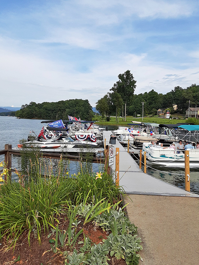Beyond the water park, a marina full of boats stands ready for deeper lake adventures. Georgia's mountains create a backdrop worthy of a travel magazine.