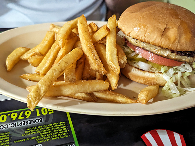 This burger isn't just a meal&mdash;it's a commitment. Perfectly toasted bun, fresh toppings, and fries standing at attention, ready for duty.