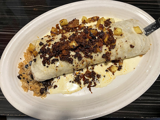 This isn't just a burrito&mdash;it's architecture with attitude. Layers of flavor wrapped in a flour tortilla fortress, crowned with fresh toppings.