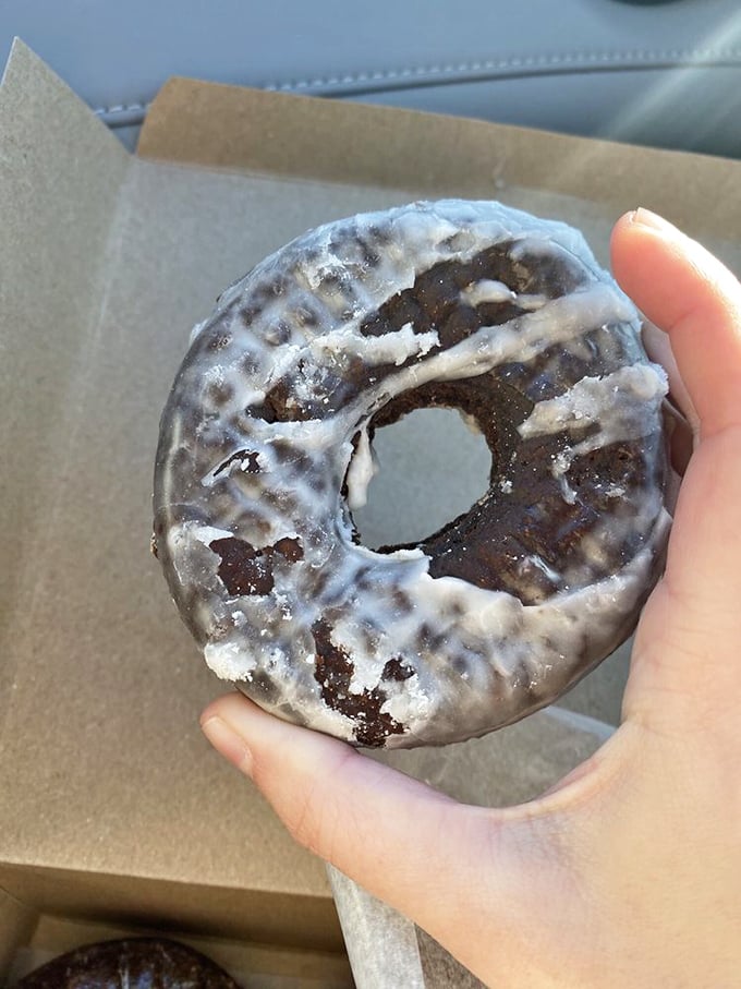 Car steering wheels were designed specifically to hold donuts like this. The chocolate glaze creates a shell so perfect NASA engineers should study it.