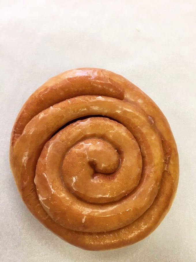 The hypnotic spiral of this cinnamon roll is basically a sugar vortex that's impossible to resist. Follow it to flavor town!