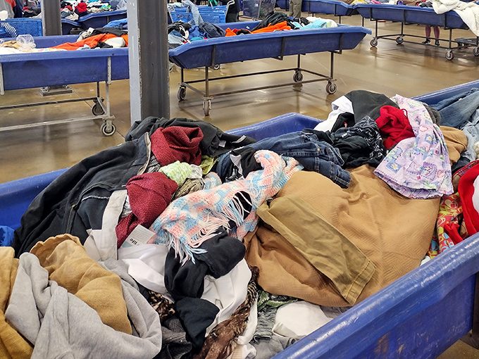 Textiles of every imaginable pattern, color, and era create a layered history of fashion. Someone's discarded coat becomes tomorrow's vintage find.