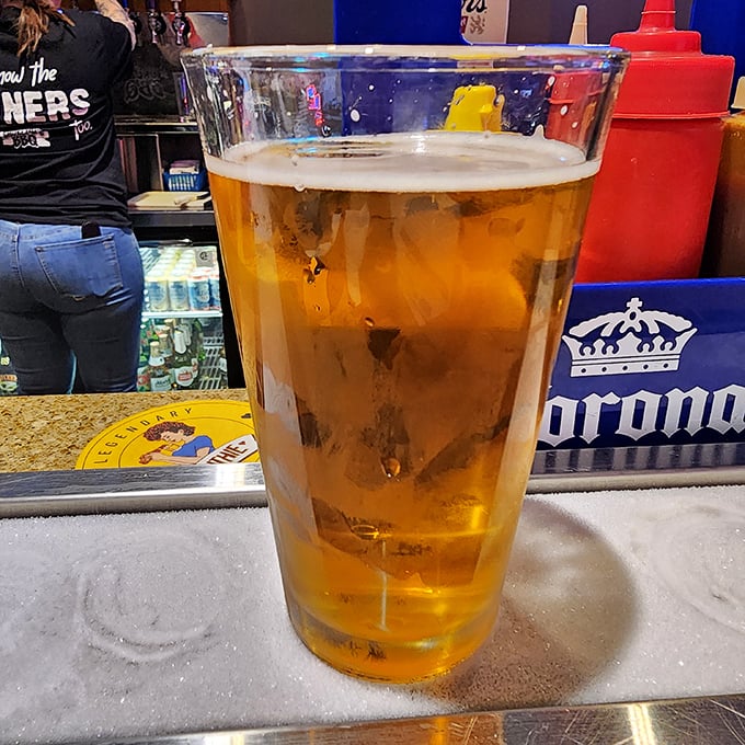 A cold beer in a proper pint glass&mdash;because great BBQ demands a proper beverage companion to cut through all that smoky richness.